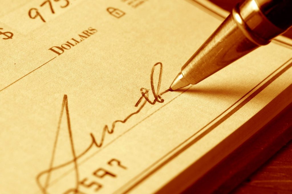 Cheque Vs Check: The Key Differences Explained